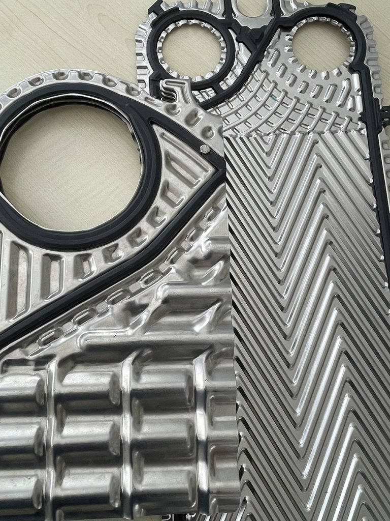 Free flow exchangers for heat recovery in textile dyeing processes ...